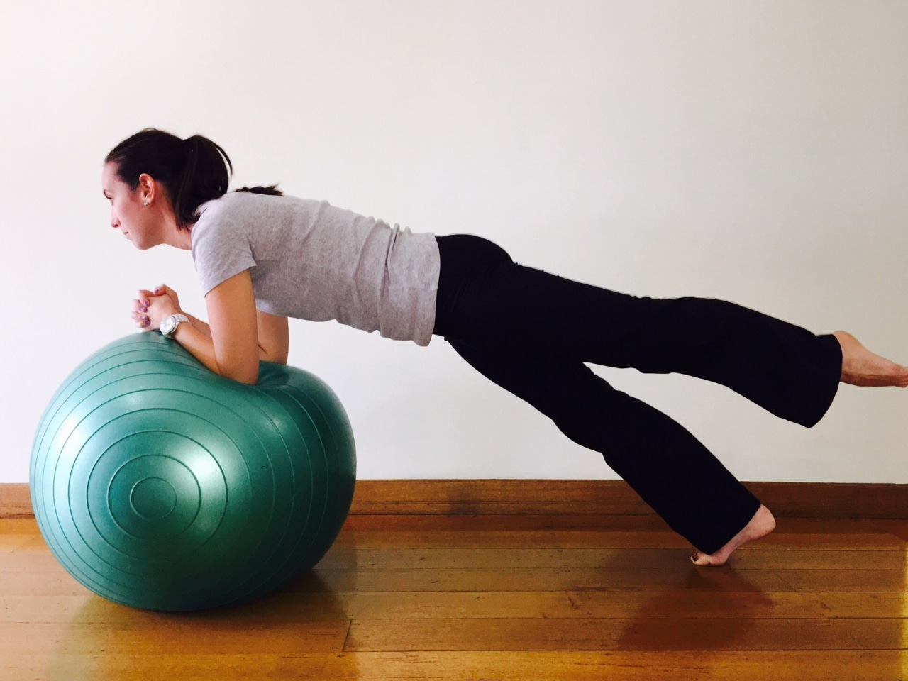 Allyson one leg plank on ball - Physiotherapy Centre Ivanhoe
